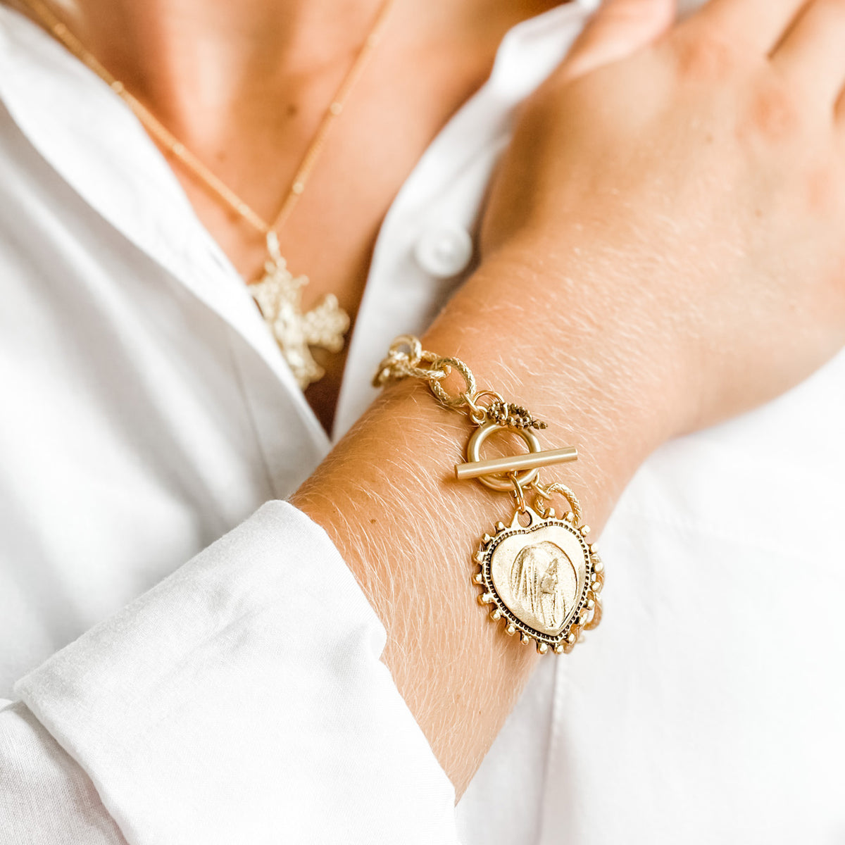 Twisted Chain Toggle Bracelet featuring Jen's Gold Mary Heart ...